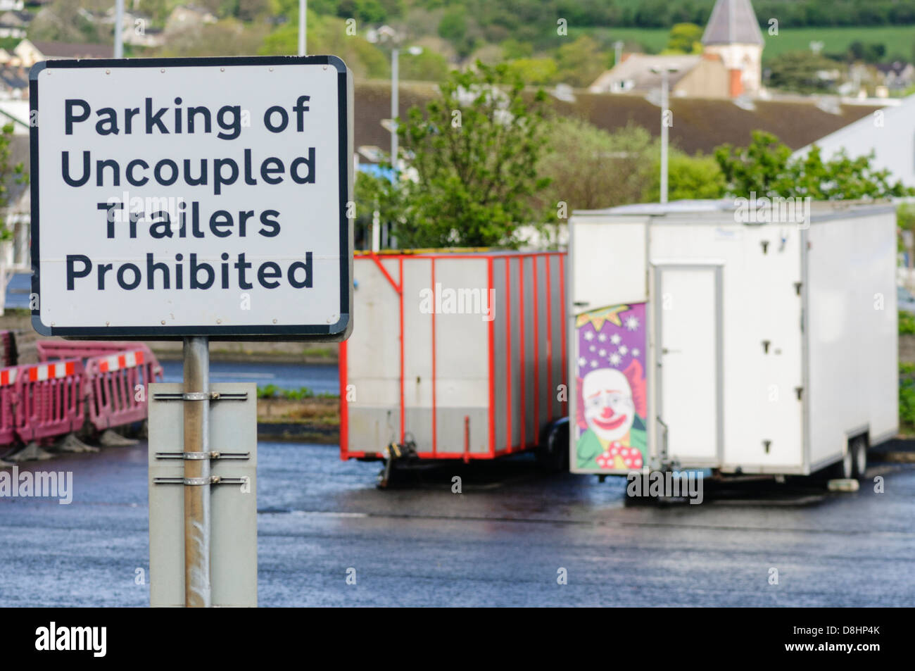 Sign in a car park forbidding parking of uncoupled trailers, with ...