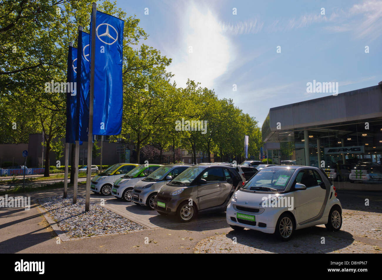 Smart micro compact cars on display at a Mercedes Benz car dealer ...
