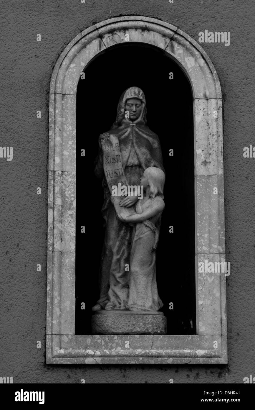 Stone sculpture on wall Black and White Stock Photos & Images - Alamy