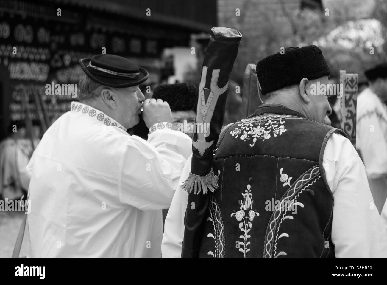 Folk men in costume Stock Photo - Alamy
