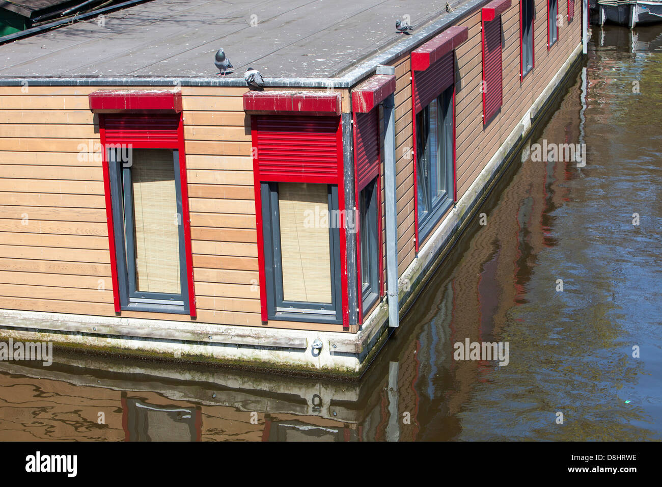 A floating house in Amsterdam, Netherlands Stock Photo - Alamy