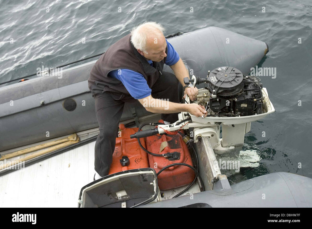 Engineer person working on boat engine Stock Photo - Alamy