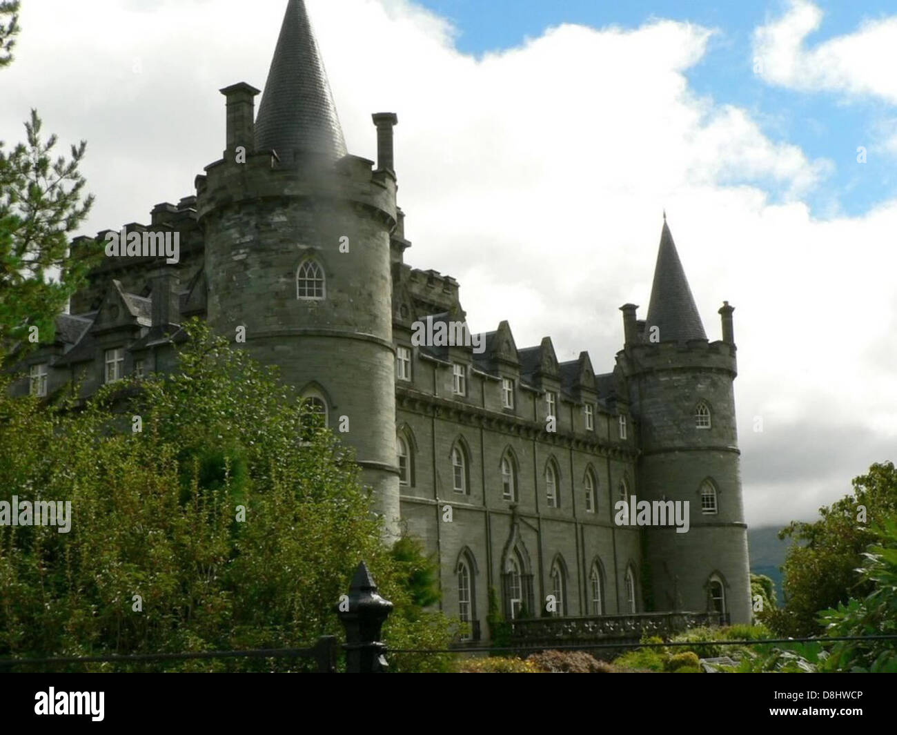 A majestic fairy tale castle with towering spires and ornate ...