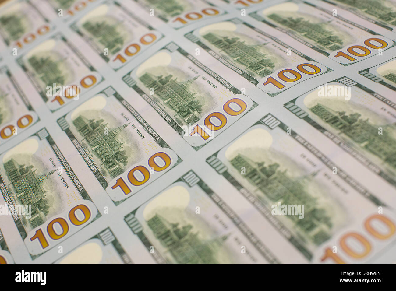 The newly redesigned $100 bill being printed at the Bureau of Engraving ...