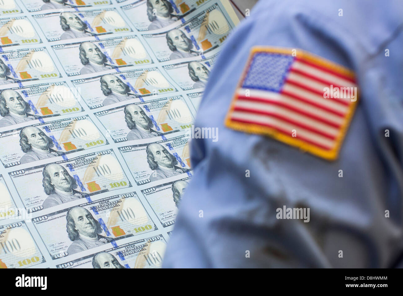 The newly redesigned $100 bill being printed at the Bureau of Engraving ...