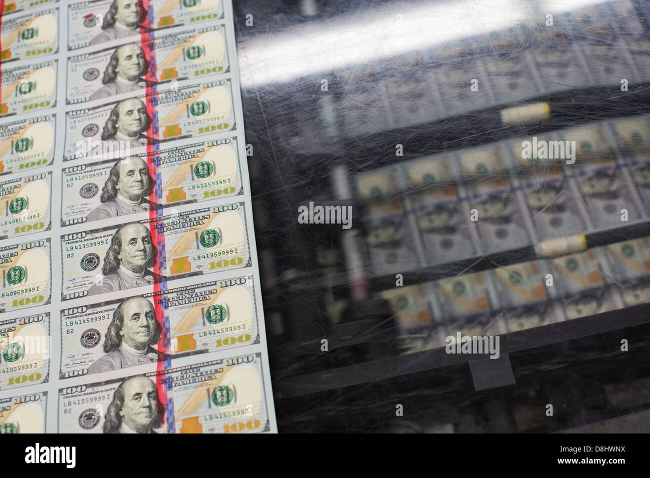The newly redesigned $100 bill being printed at the Bureau of Engraving ...