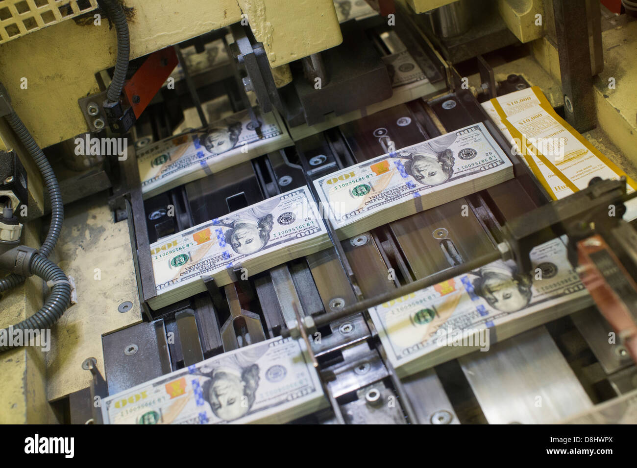 The newly redesigned $100 bill being printed at the Bureau of Engraving ...