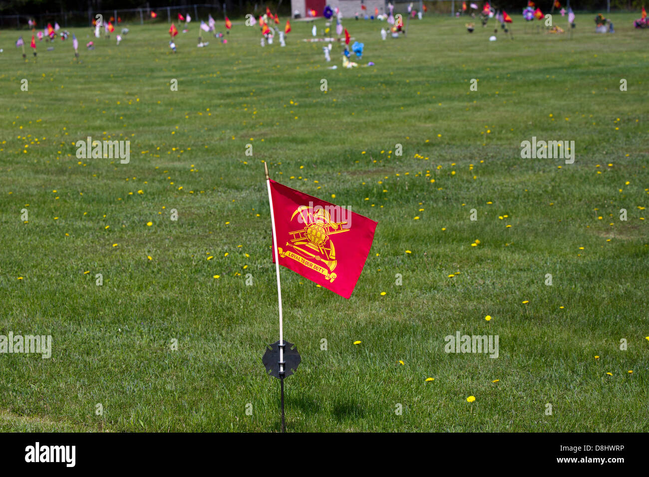 Firefighters grave marker memorial flag Stock Photo - Alamy