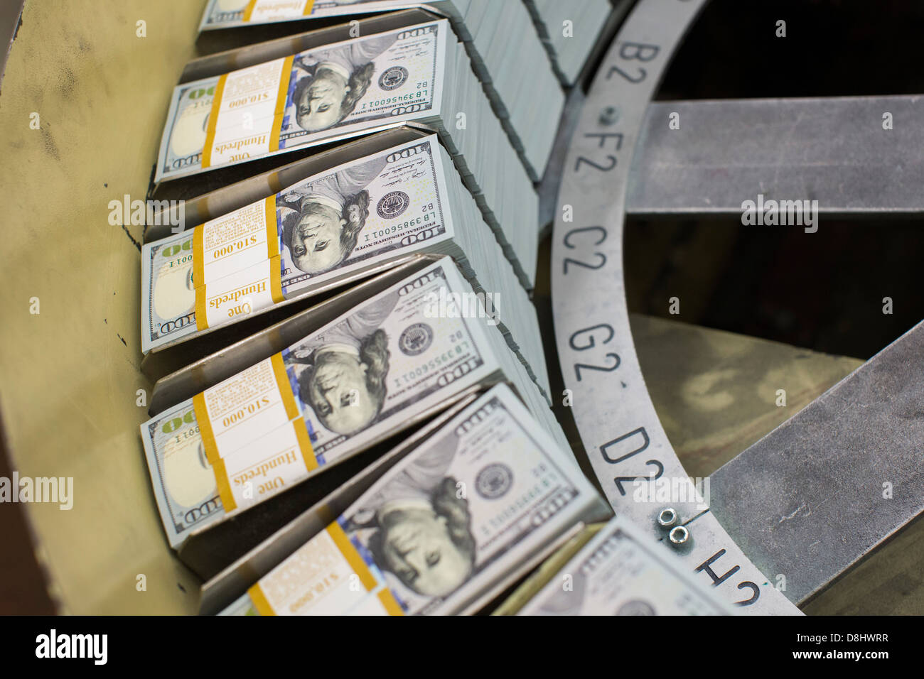 The newly redesigned $100 bill being printed at the Bureau of Engraving ...