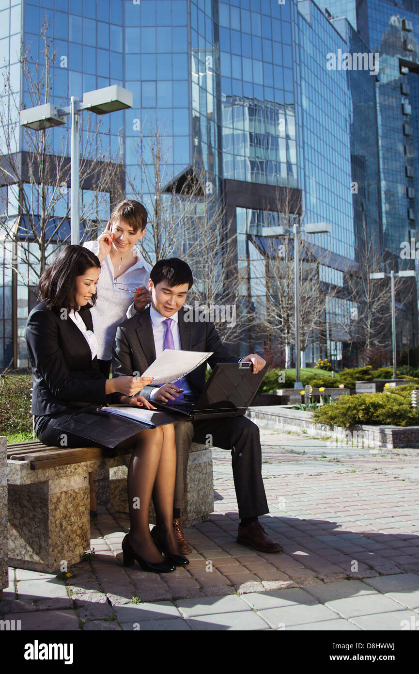 Business people meeting outdoor in front of office building Stock Photo ...