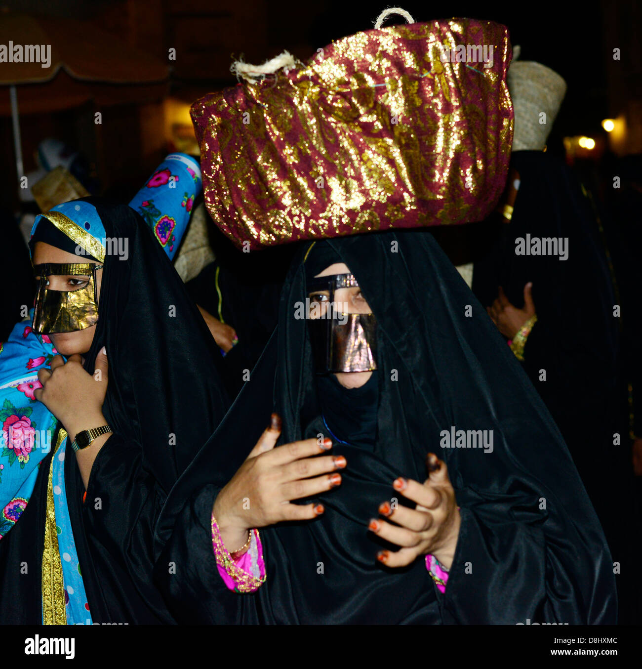 A Qatari women wearing a traditional veil Stock Photo - Alamy
