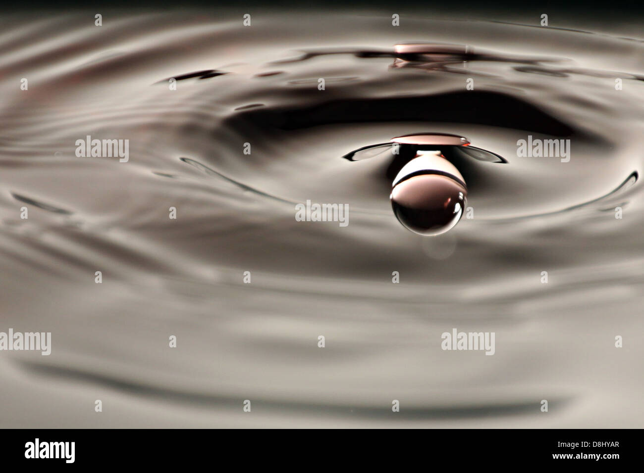 This Images water drops return upside down Stock Photo - Alamy