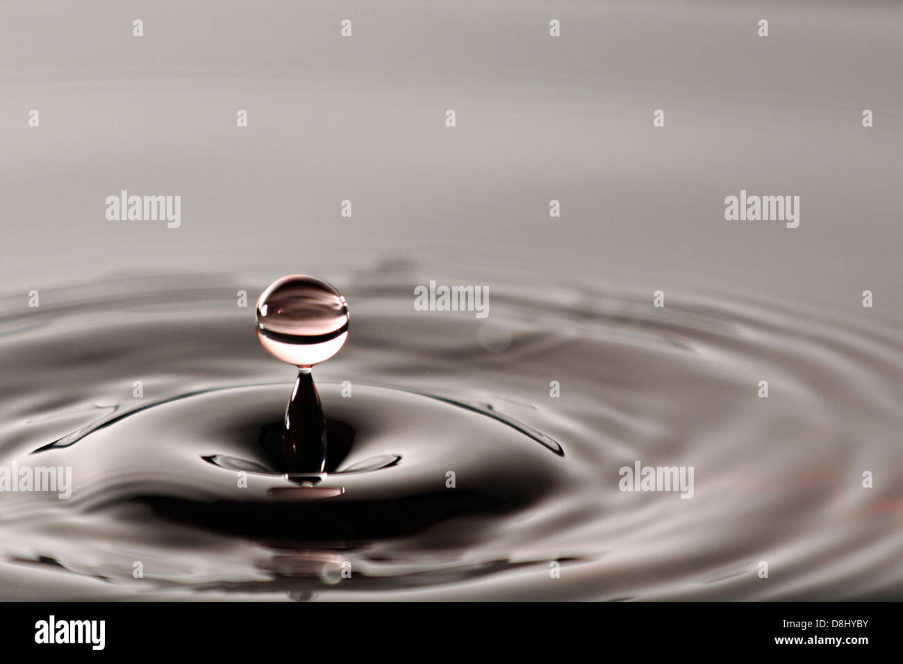 The Water drop close up into a beautiful shape,At on the side Stock ...