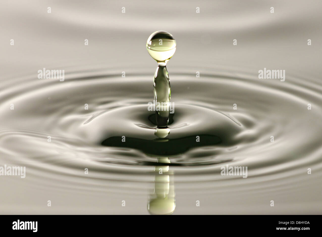 The Water drop close up into a beautiful shape Stock Photo - Alamy