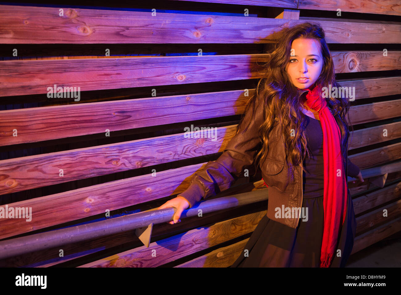 Portrait of a Pretty Mixed Race Young Adult Woman Against a Wood Wall ...