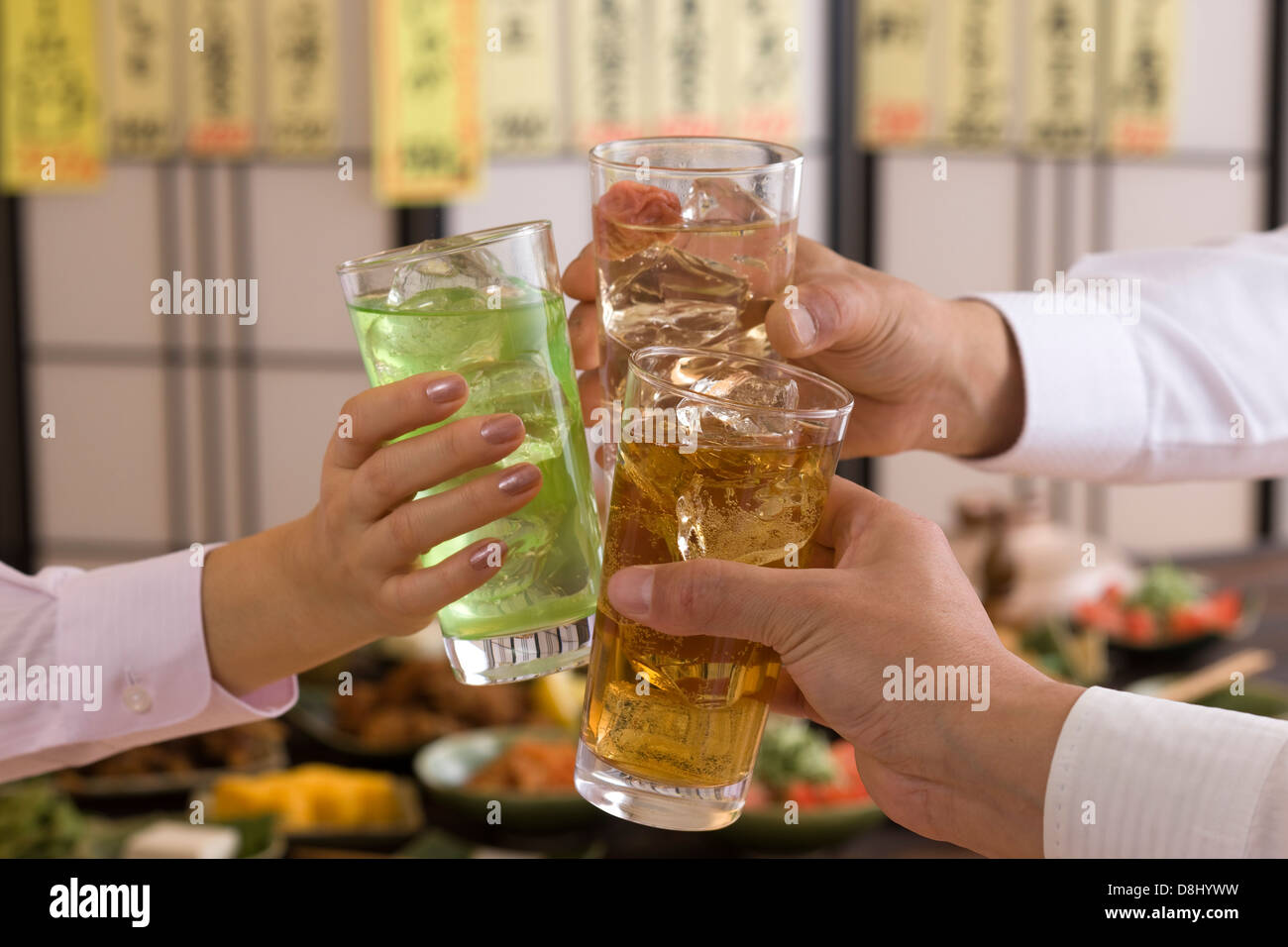 Three People Toasting with Various Chu-Hi at Izakaya Stock Photo - Alamy