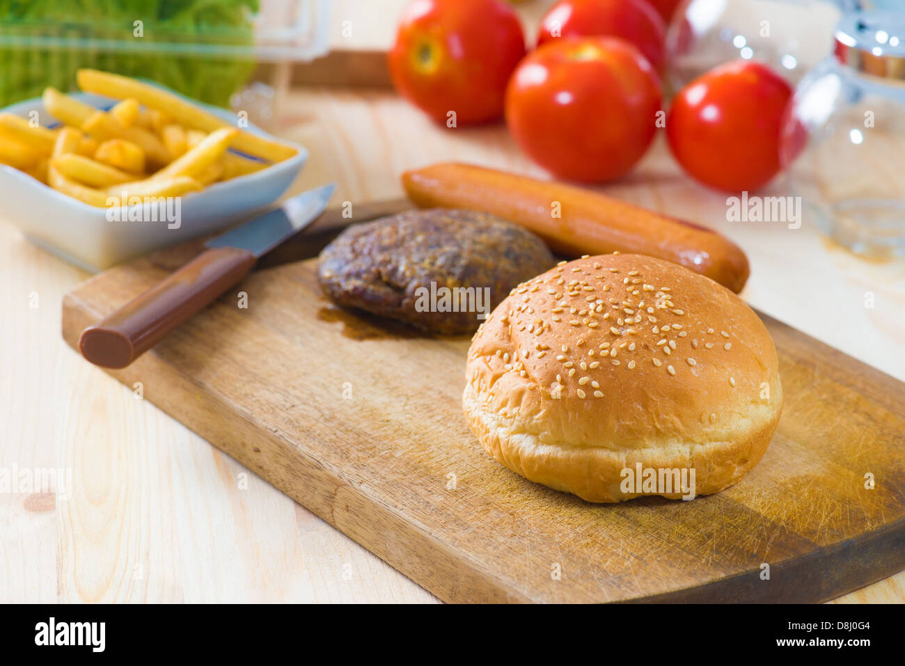 hamburger fast food ingredients with plenty of raw materials on the ...
