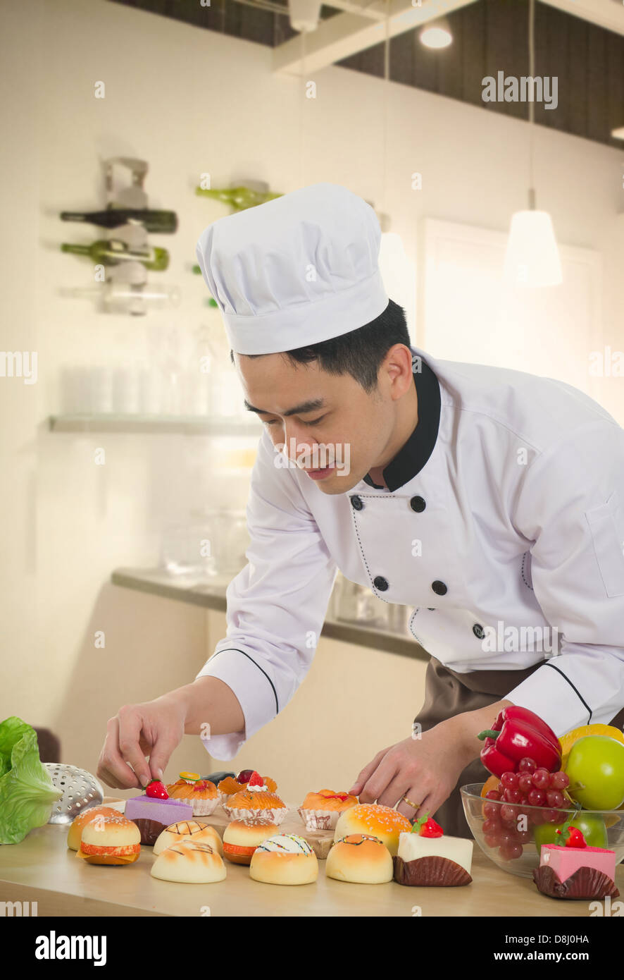 asian chinese chef preparing foods for his customer with kitchen ...