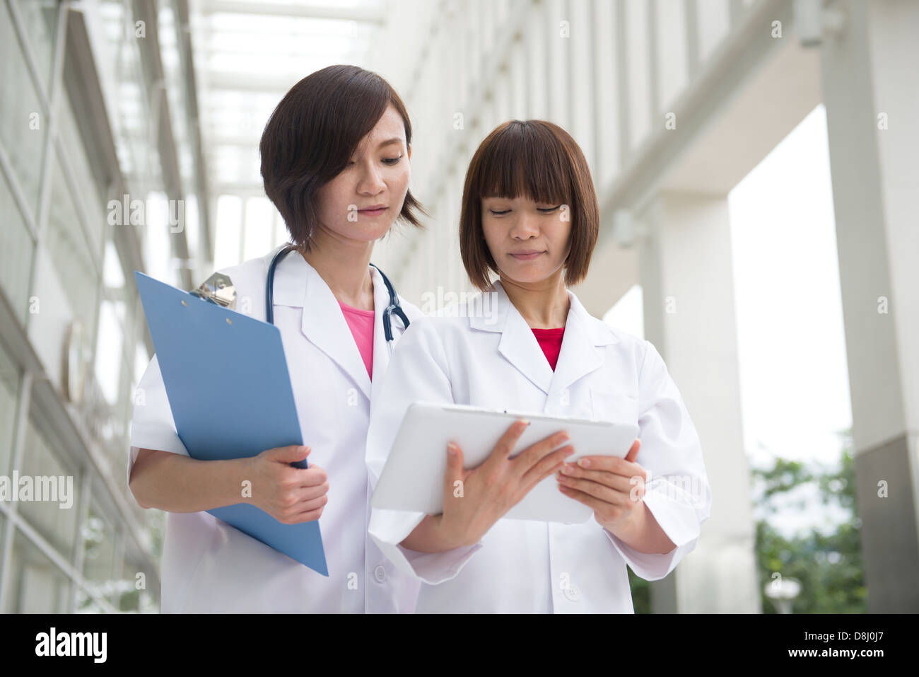 asian chinese female doctors team at the hospital Stock Photo - Alamy