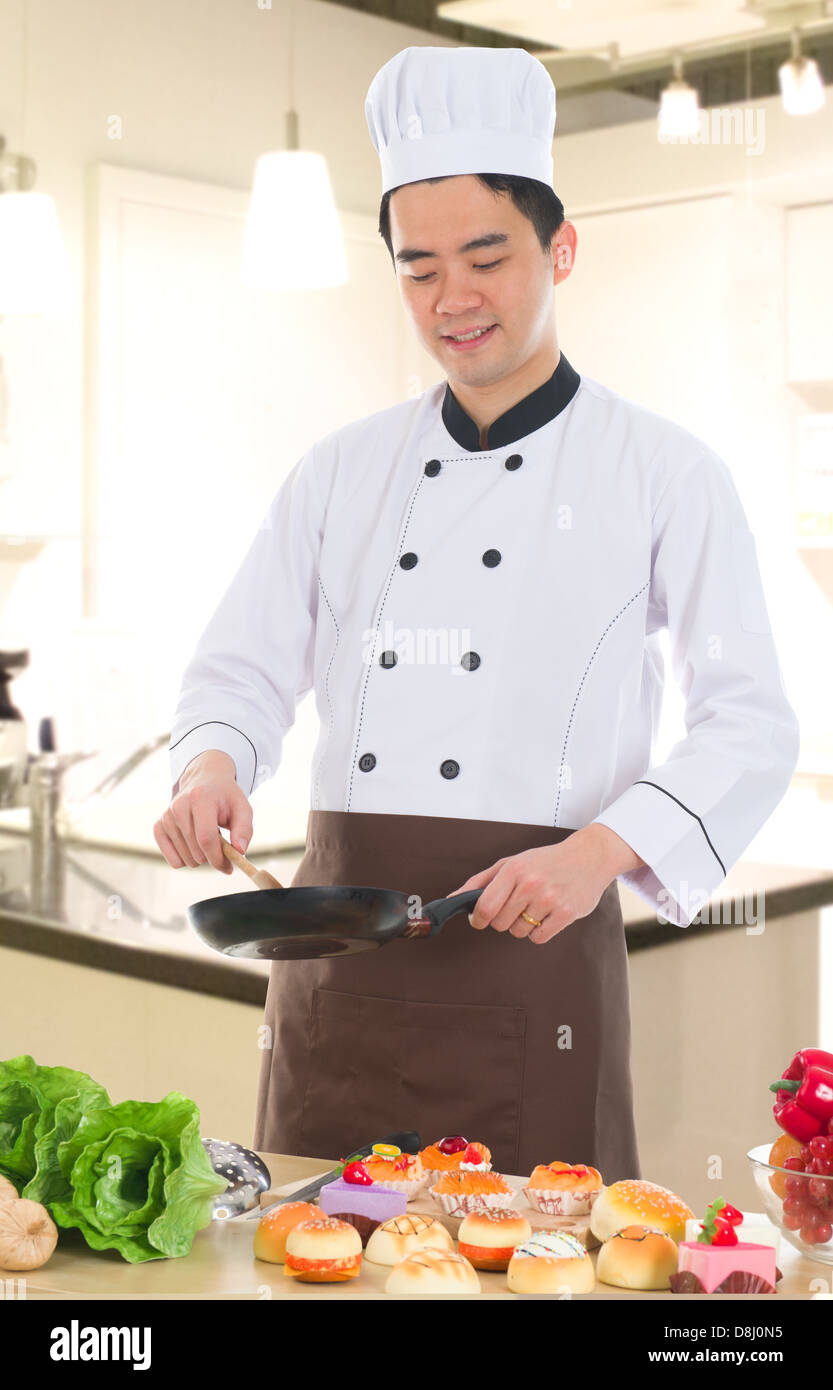 asian chinese chef preparing foods for his customer with kitchen ...