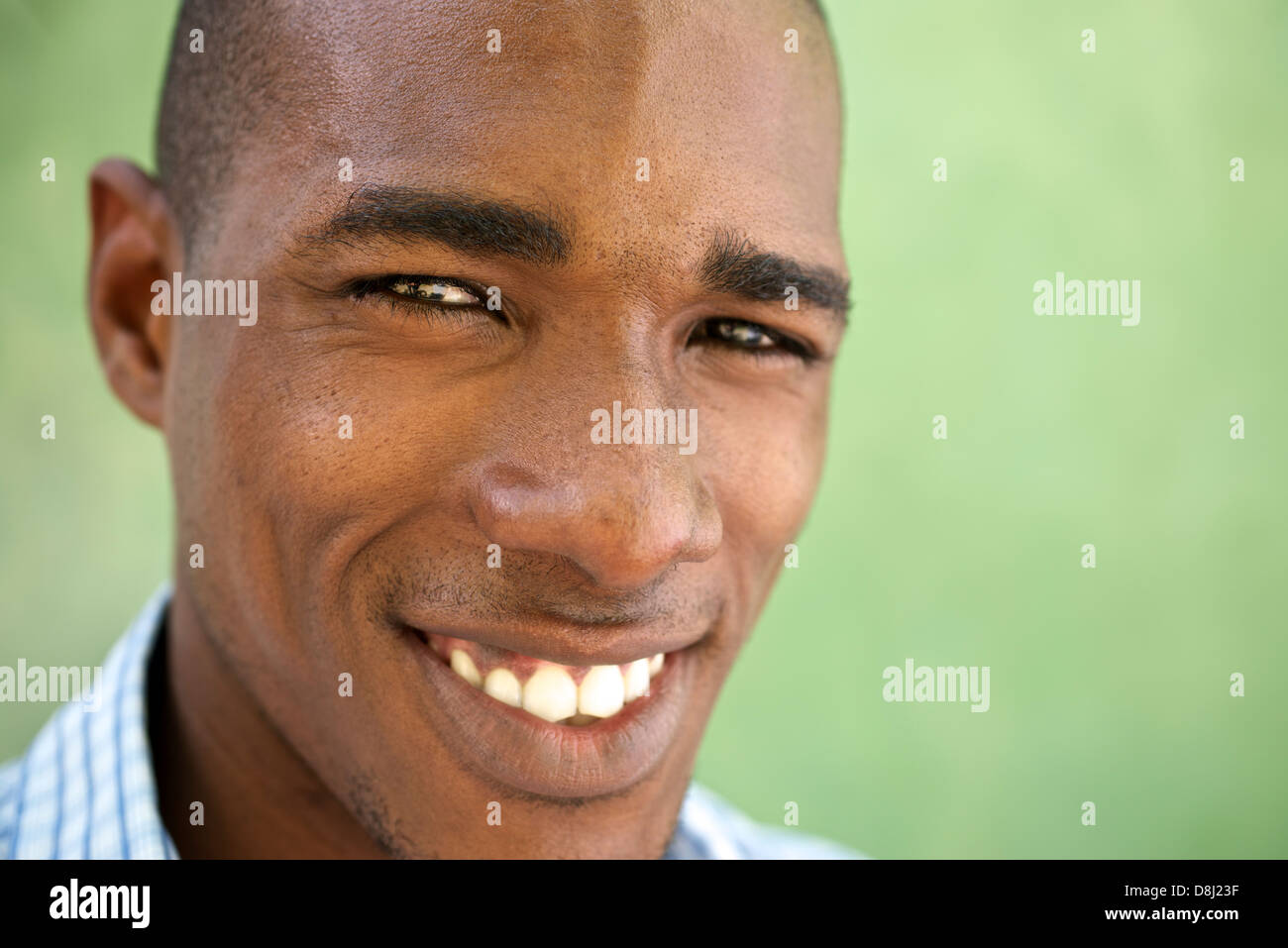 Man looking camera smile head hi-res stock photography and images - Alamy