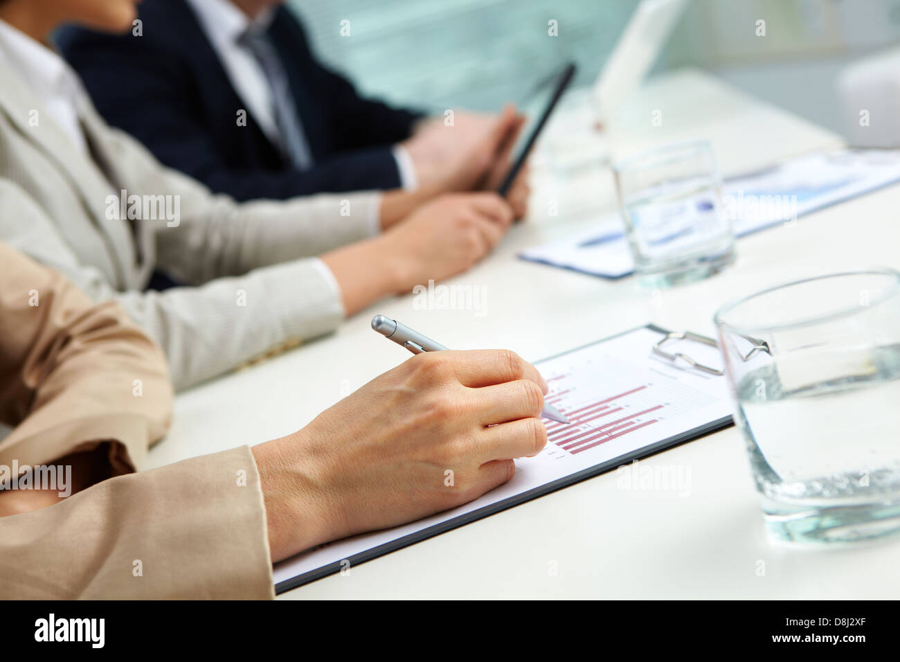 Hands of business people at work in the office Stock Photo - Alamy