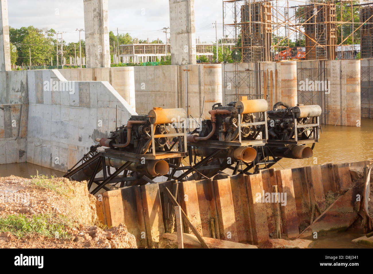 Water pumps standby at dam construction site Stock Photo - Alamy