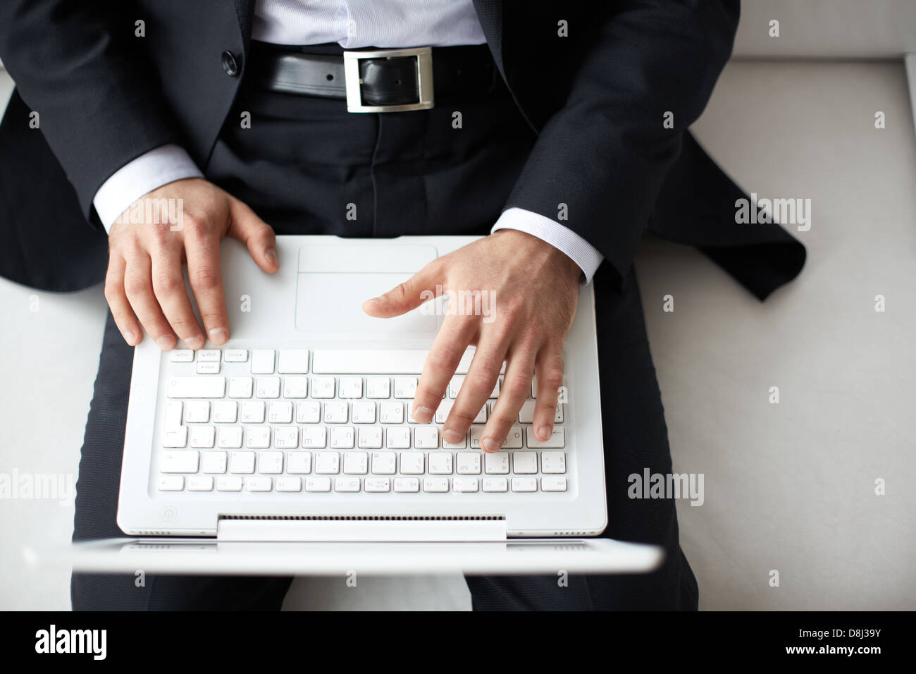 Male hands typing on laptop Stock Photo - Alamy