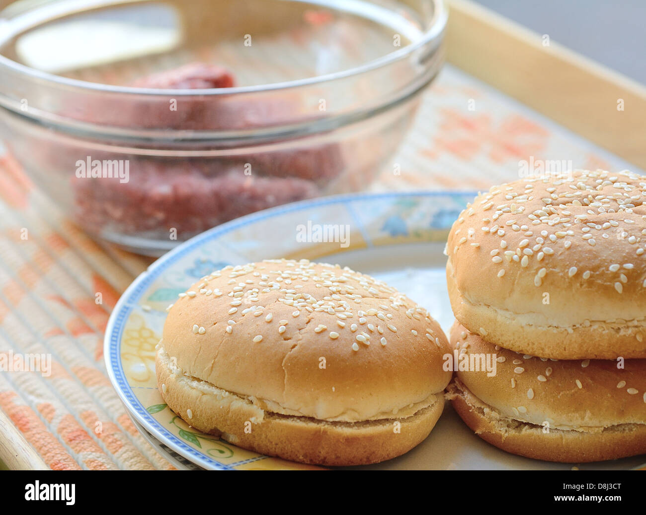 Three fresh buns prepared for the meat - hamburger Stock Photo - Alamy