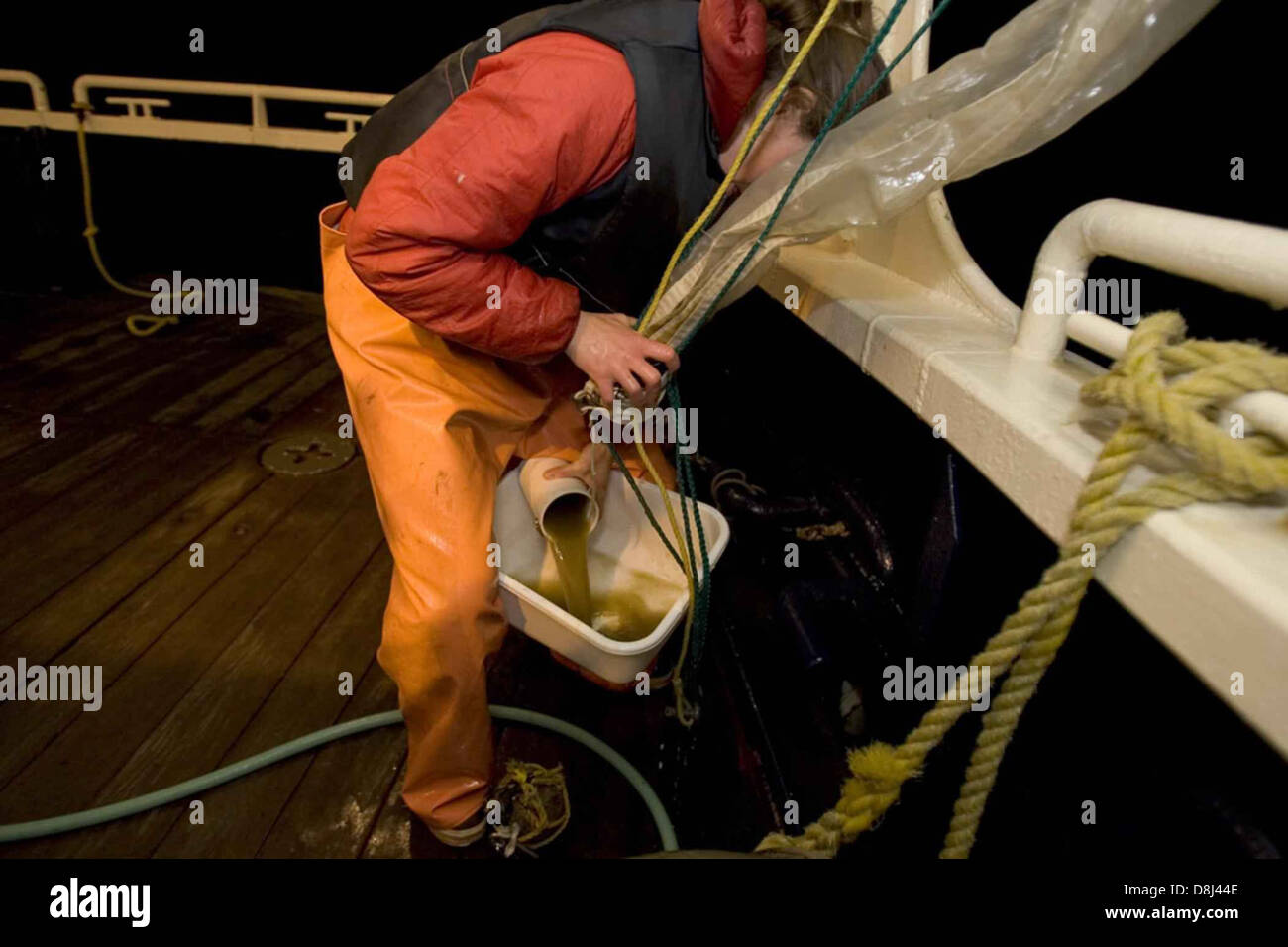 Female working on boat Stock Photo - Alamy