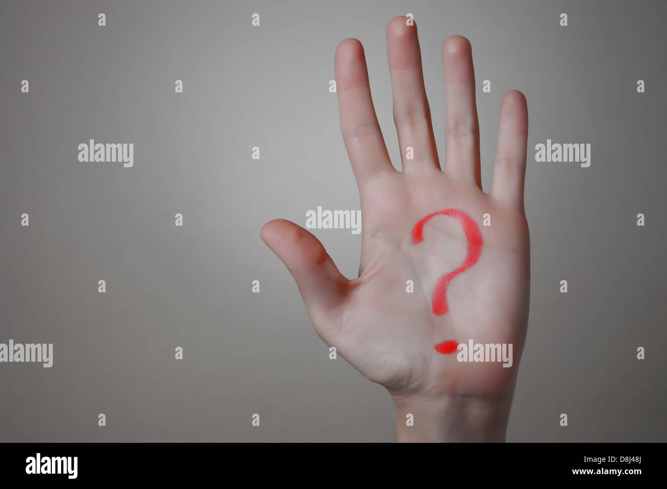 Red Question Mark on a Hand Stock Photo - Alamy