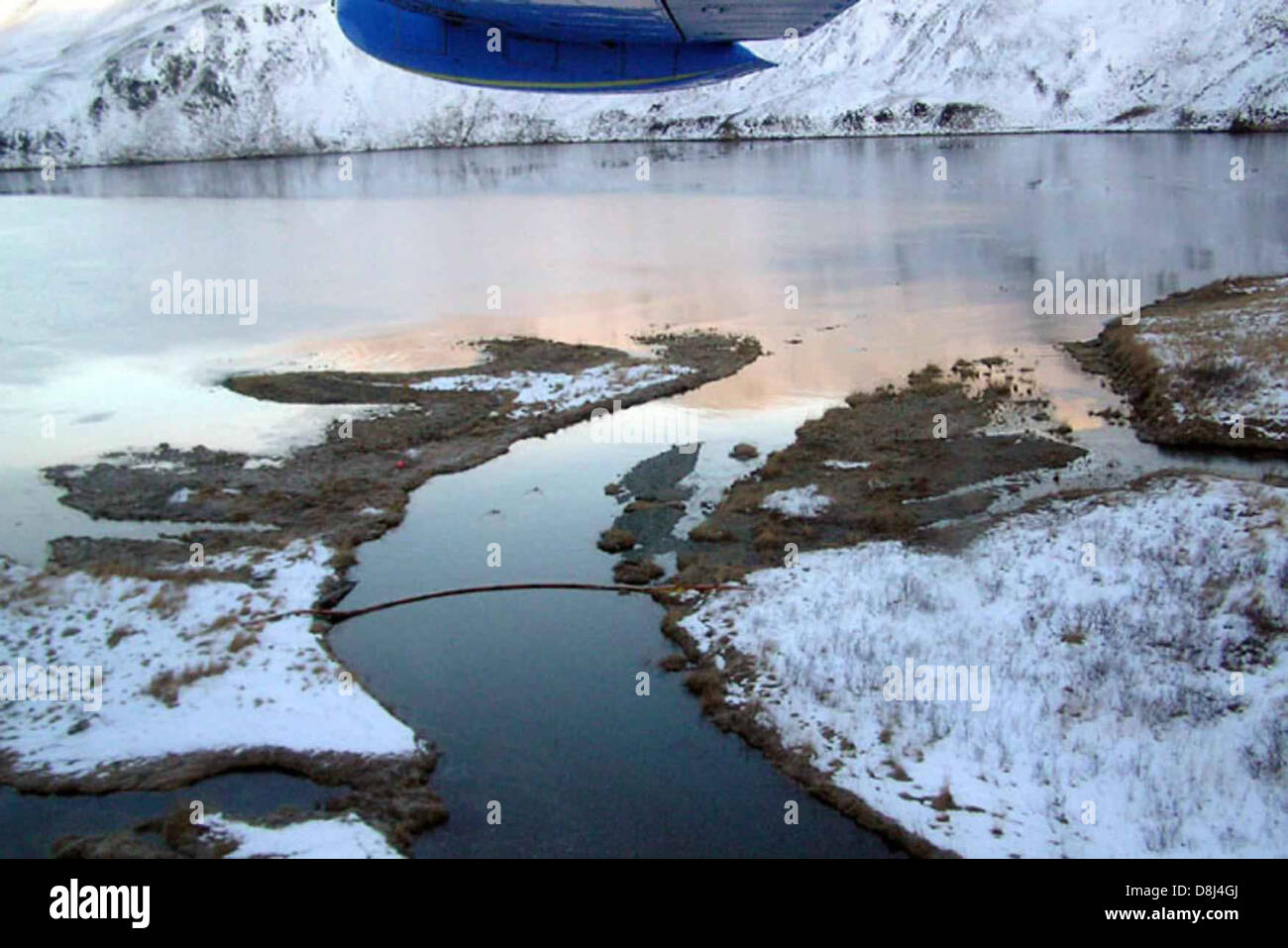 An aerial view of a bay with calm waters and surrounding coastal ...