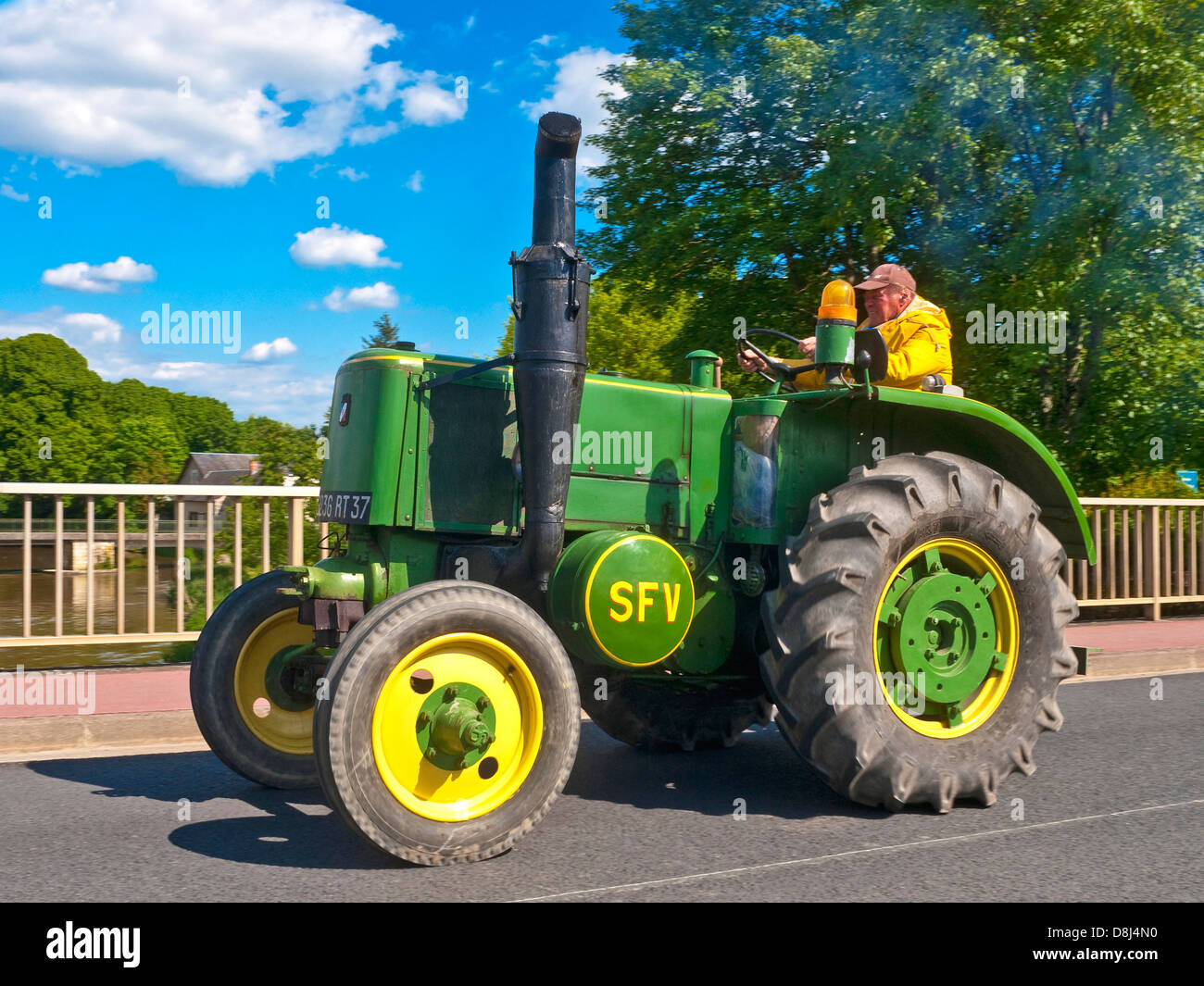 French farmer driving old restored SFV "Société Française de Vierzon ...