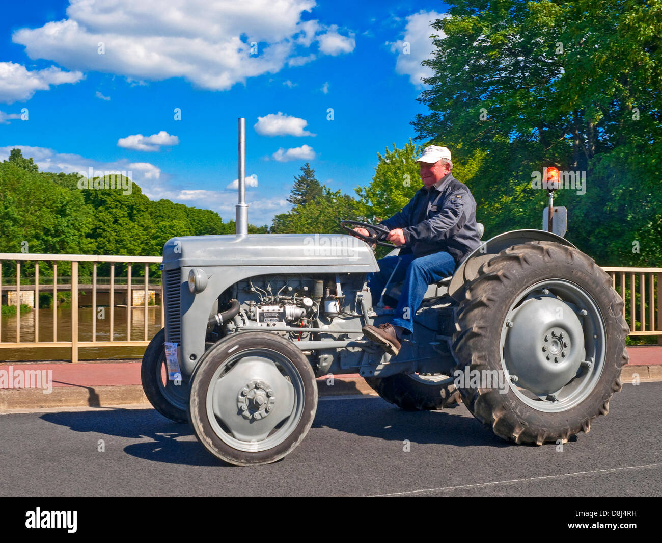 French farmer driving old restored Grey Ferguson tractor on "Retro ...