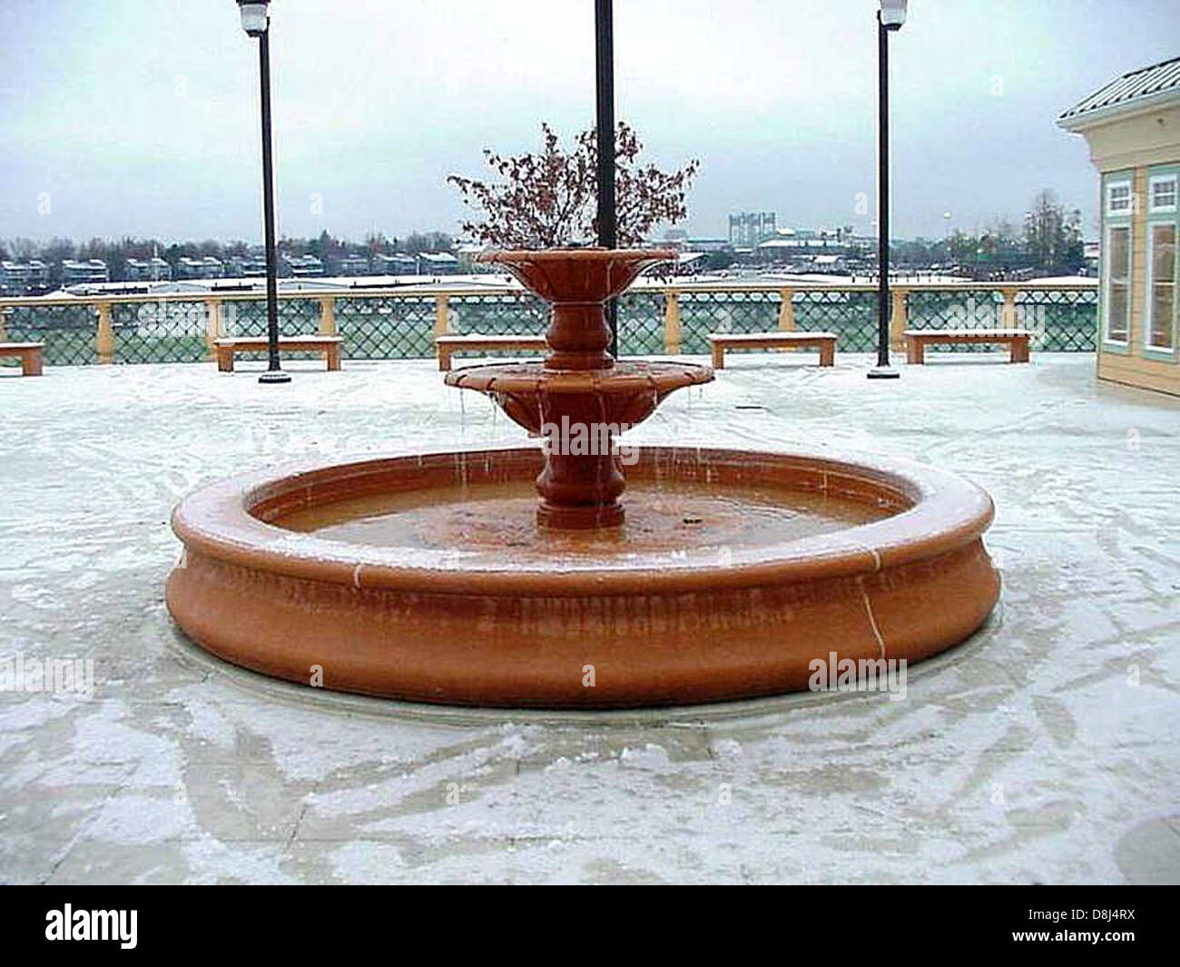 This image captures a fountain in Portland surrounded by snow. The ...