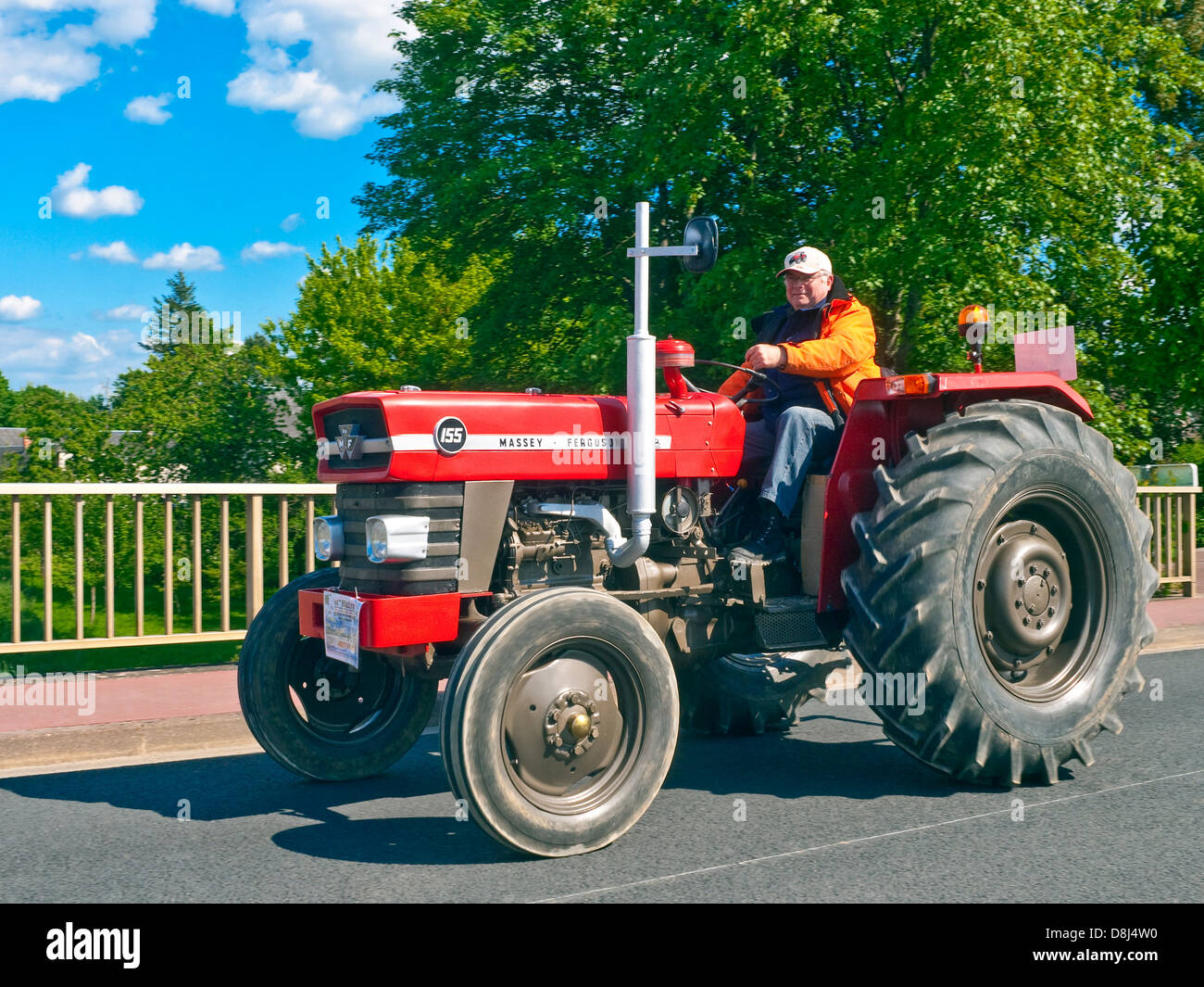 French farmer driving old restored Massey Ferguson 155 tractor on ...