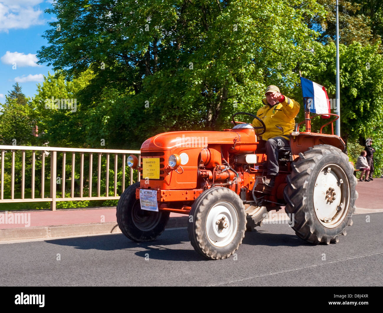 French farmer driving old restored 1956 Renault D22 tractor on "Retro ...