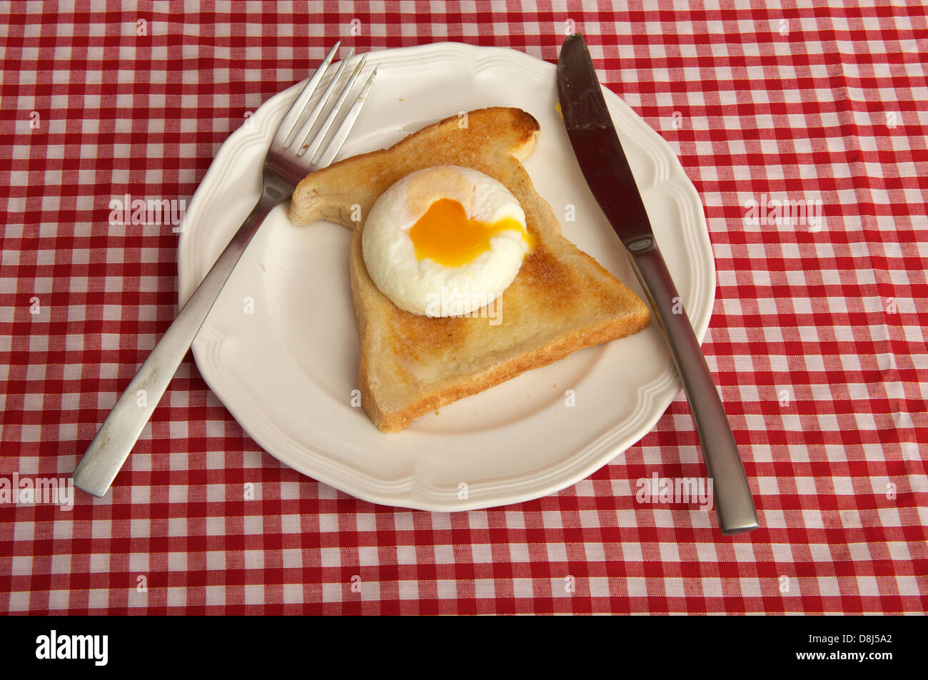 Poached egg on toast Stock Photo - Alamy