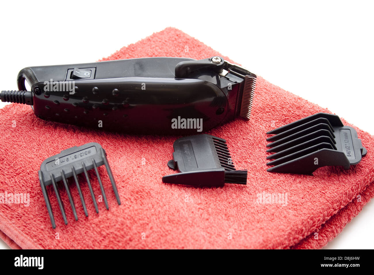 Electric clippers with utensils Stock Photo - Alamy
