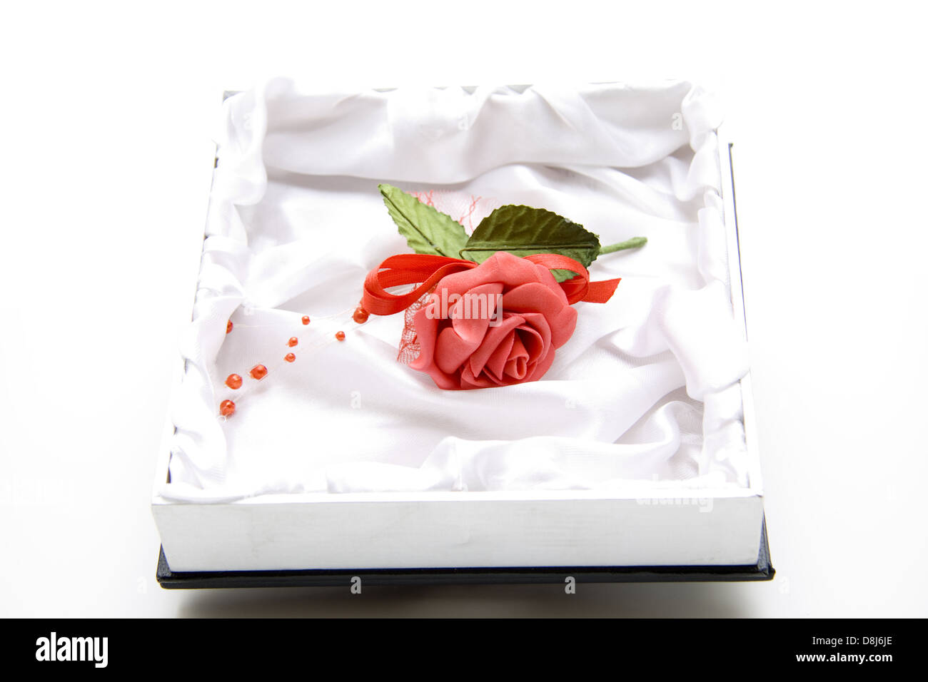 Rose in the case Stock Photo - Alamy