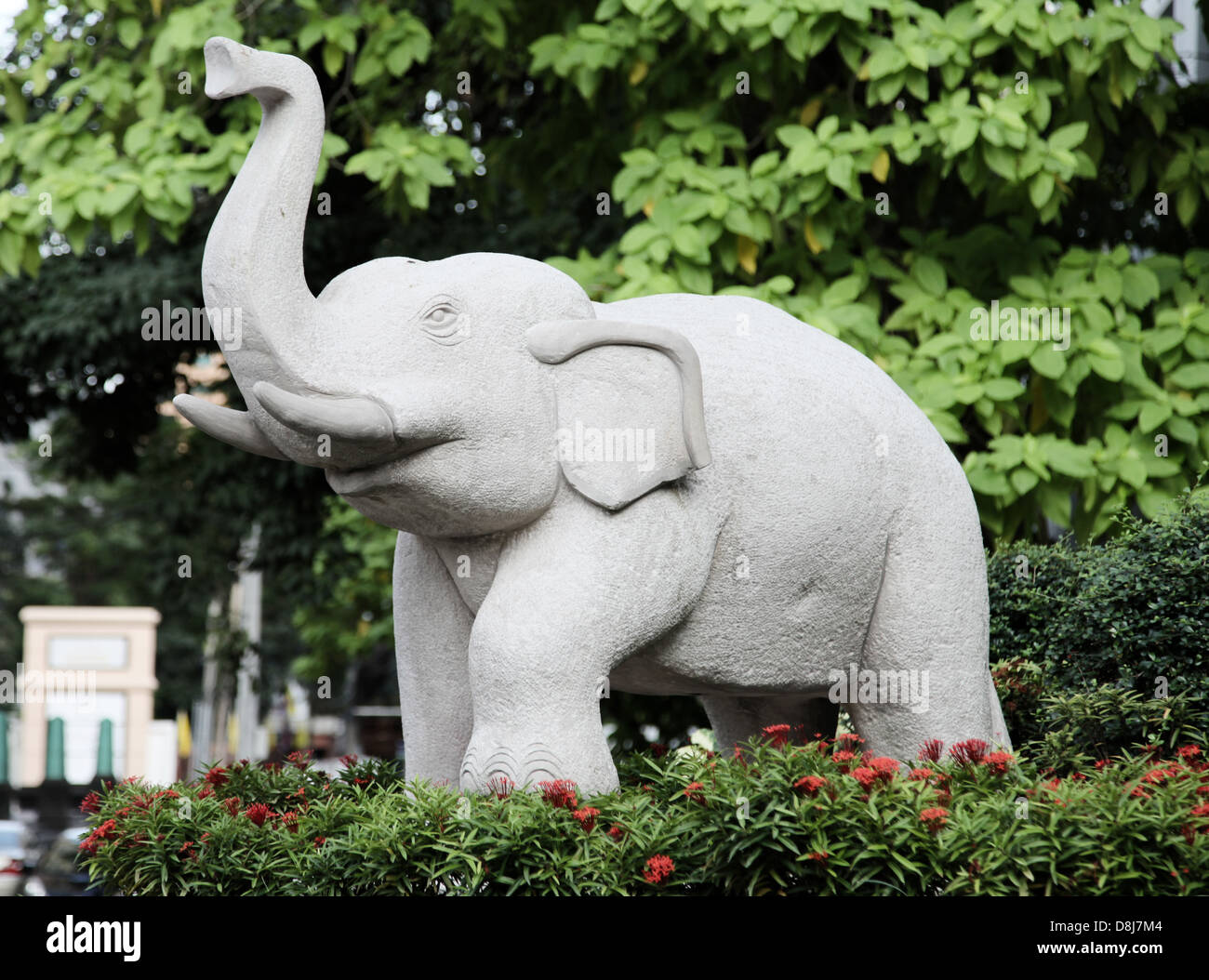 It's a photo of an elephant sculpture. It's a wood or stone statue. We ...