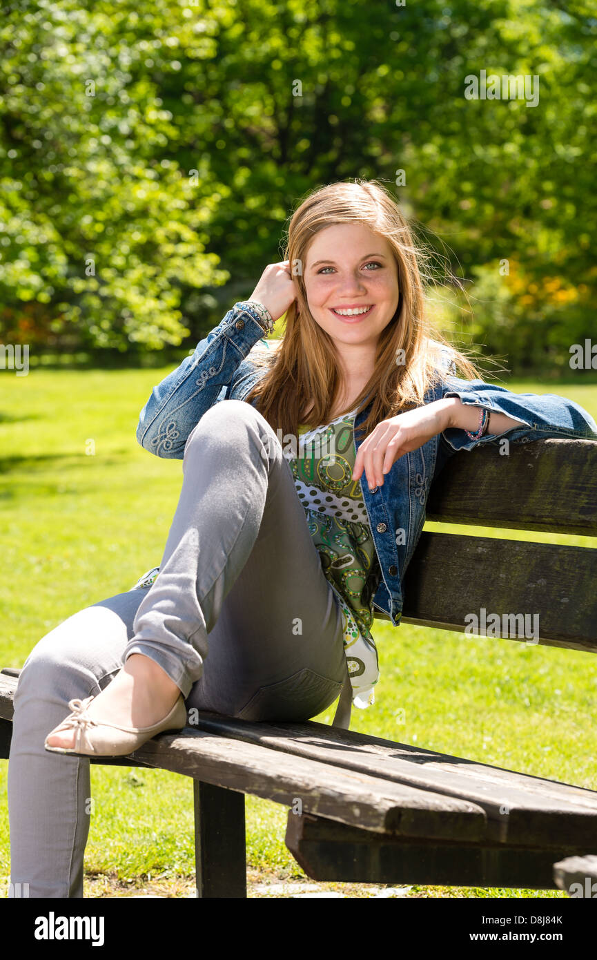 Girl sunbathing in park hi-res stock photography and images - Alamy