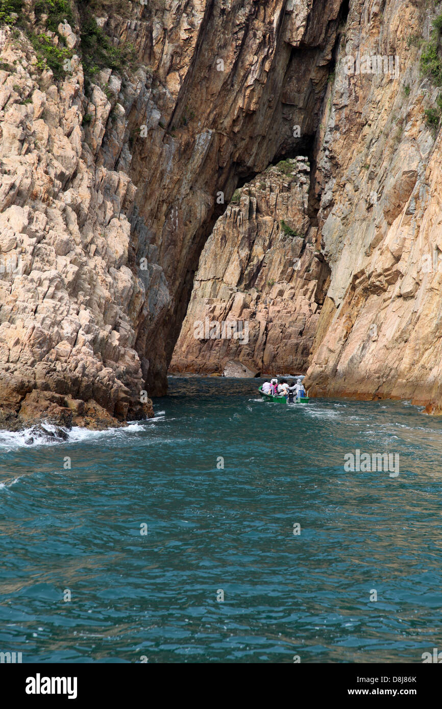 It's a photo of cliffs or cliff near the sea or ocean. We can see a ...