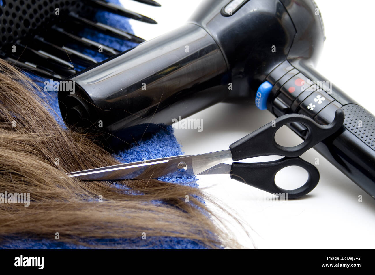 Hairdrier with scissors Stock Photo - Alamy