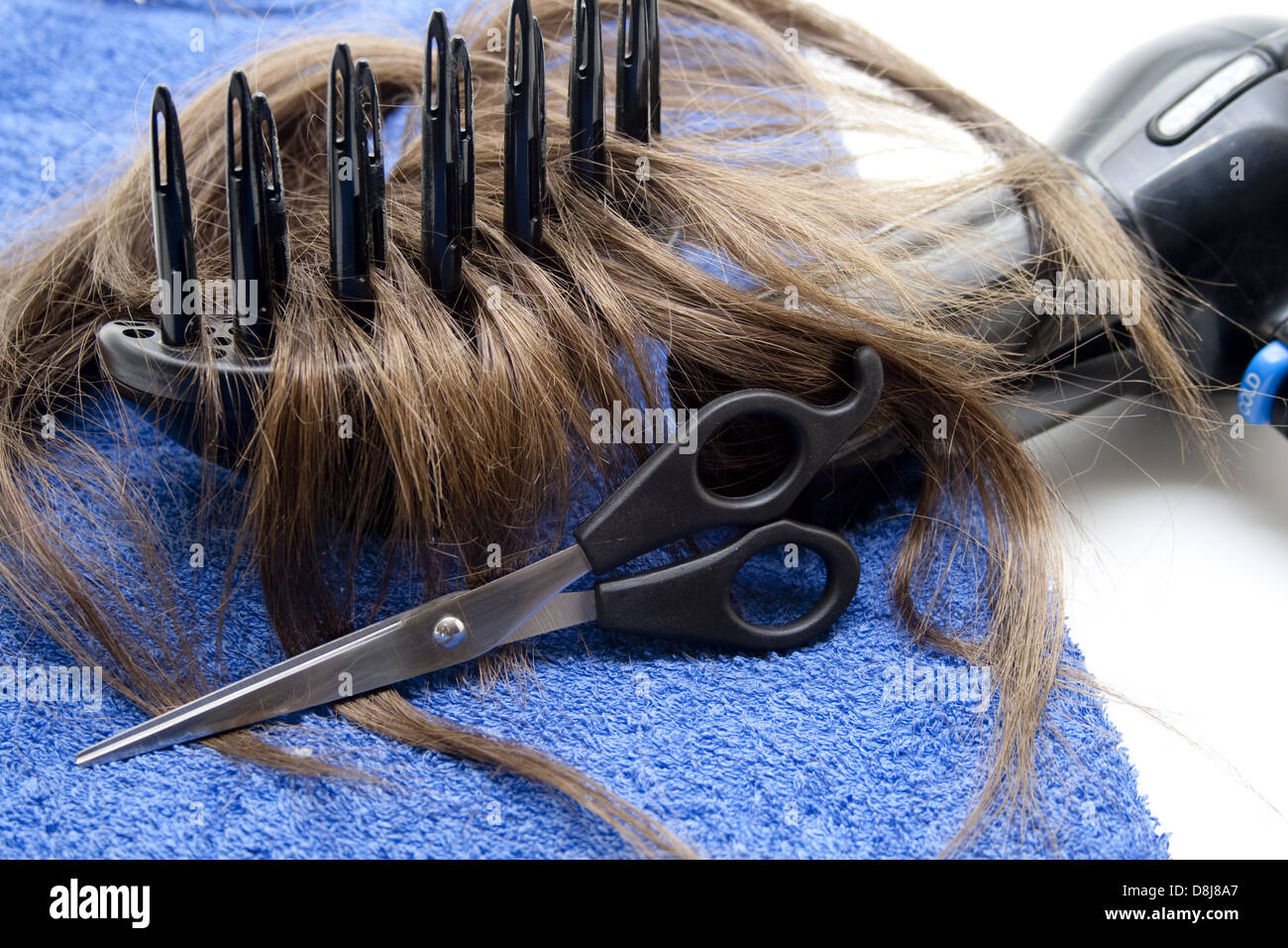 Hairdrier with scissors Stock Photo - Alamy