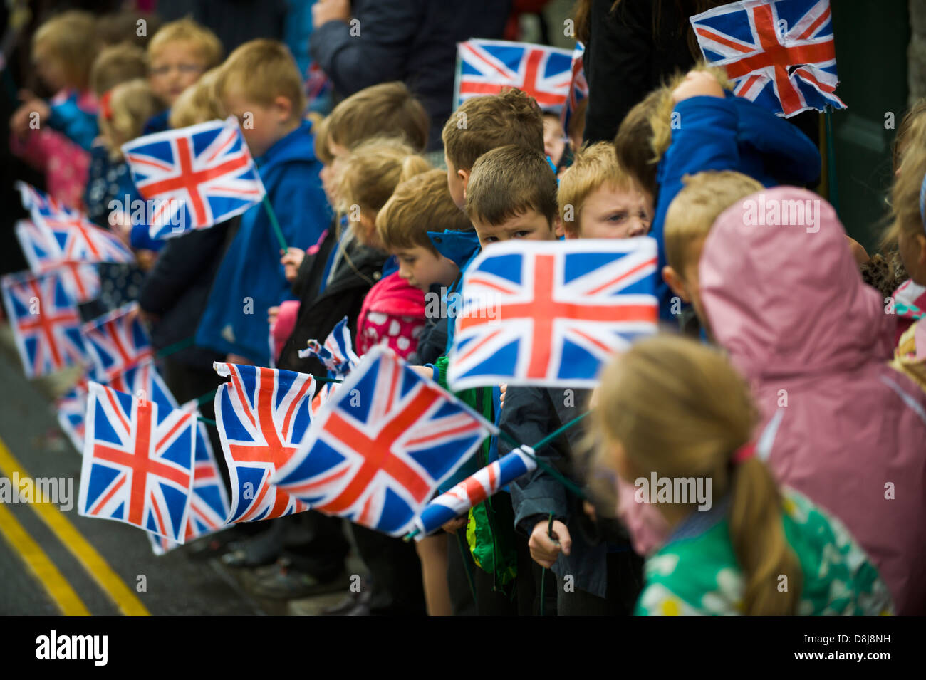 Children waving british flags hi-res stock photography and images - Alamy