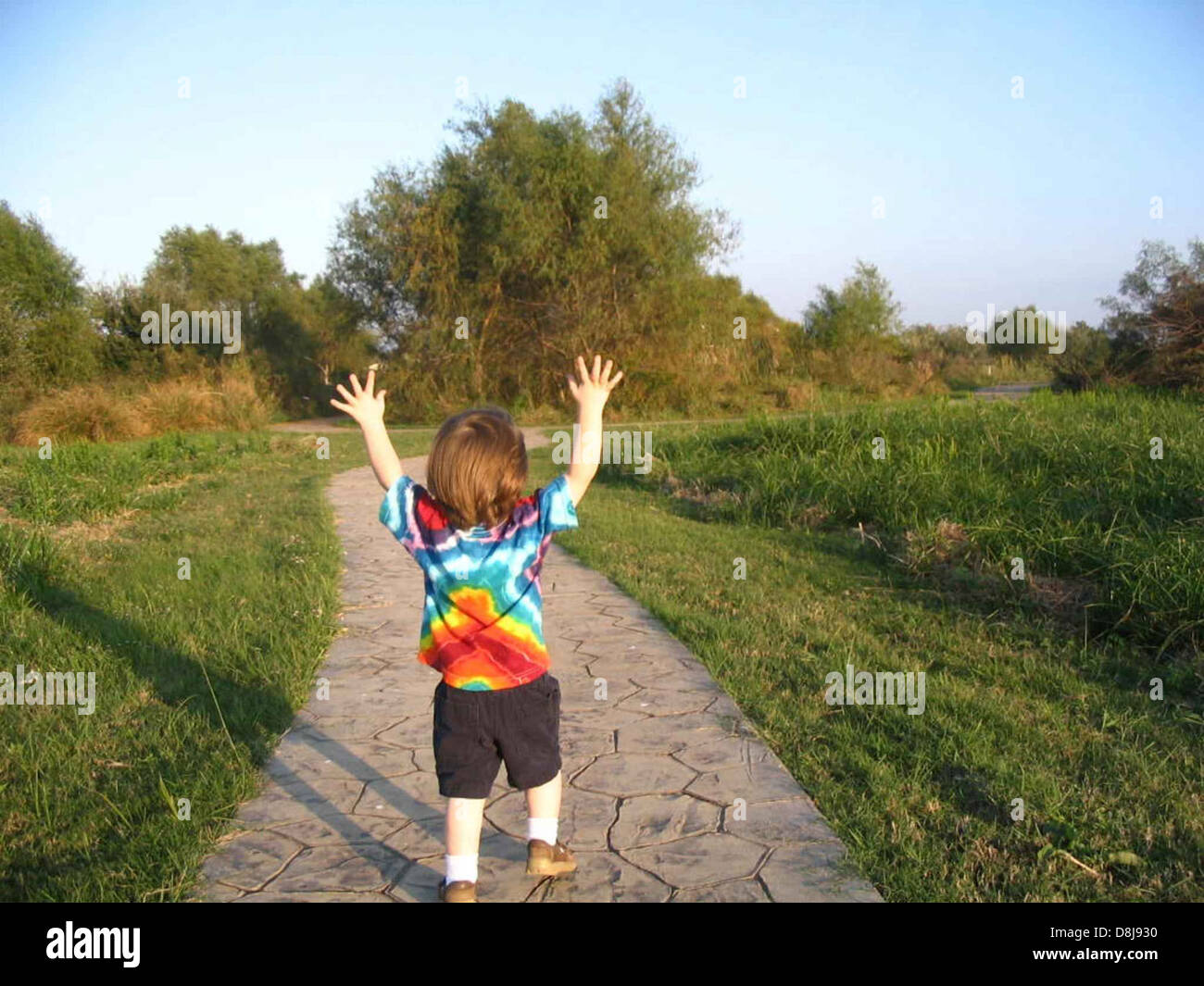 A joyful child experiencing happiness, often in simple activities like ...