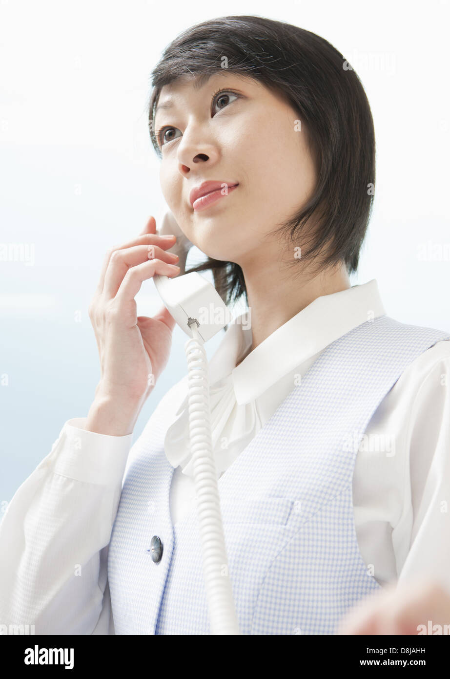 Office clerk making a call Stock Photo - Alamy