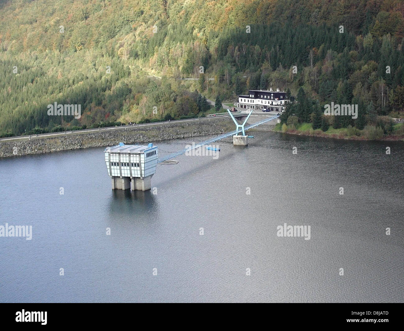 A hydroelectric power plant, showcasing the dam and turbines used to ...