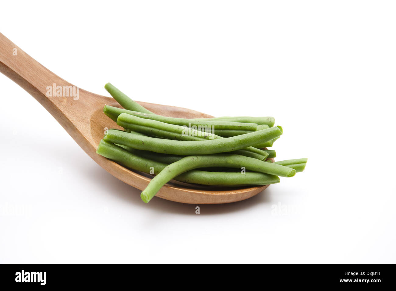 Beans on spoon Stock Photo - Alamy